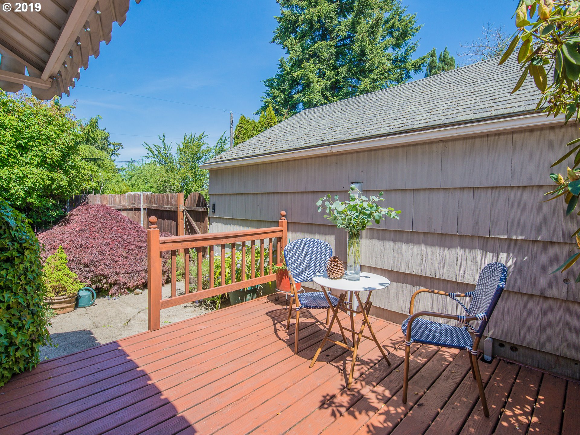 Garden Hideaway Loaded with Versatility! - Living Room Realty